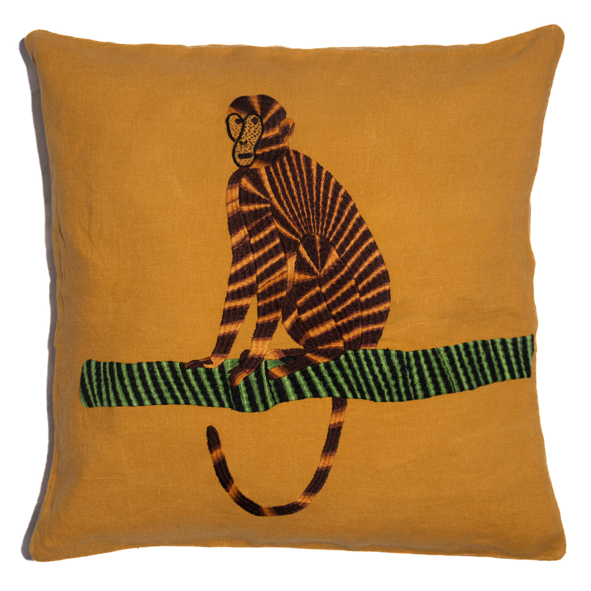 Monkey pillow on yellow linen – The Milaya Project